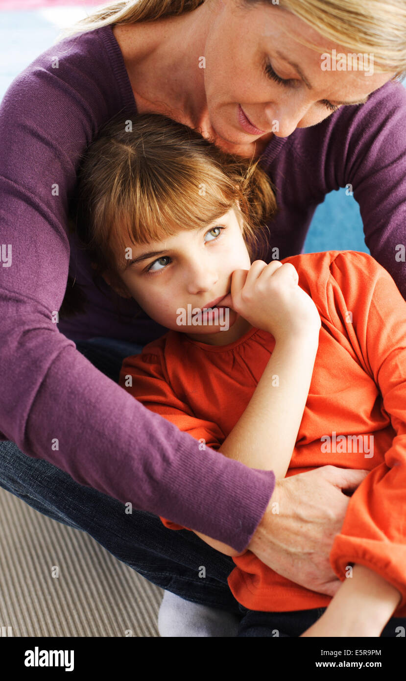7 year old girl with her mother Stock Photo - Alamy