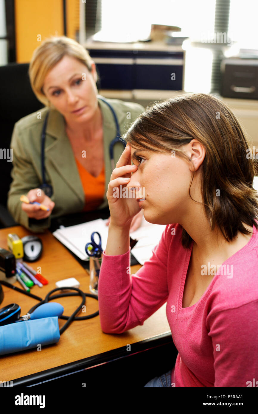 General practitioner talking with a patient Stock Photo - Alamy