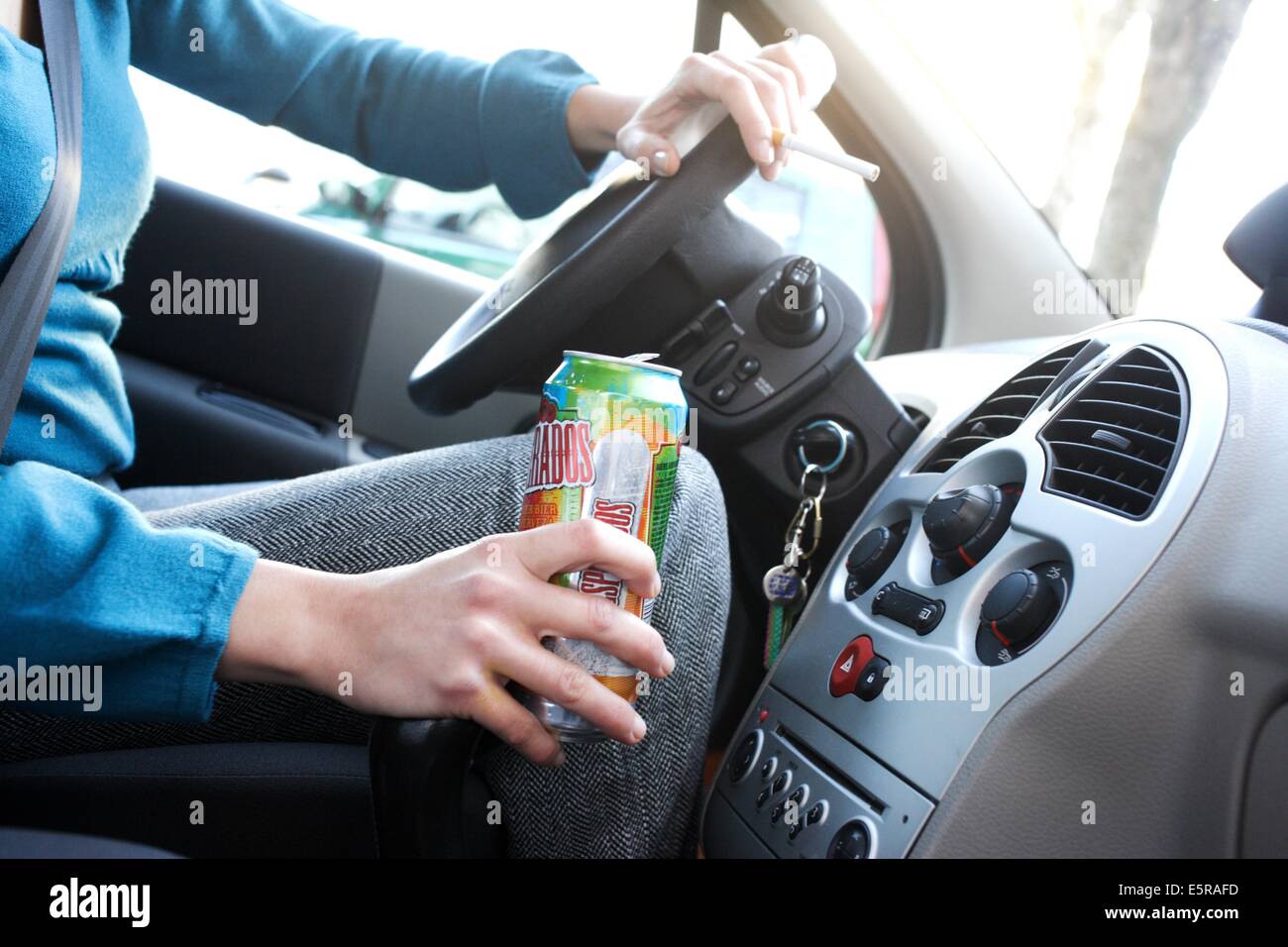 Woman car drinking and smoking Stock Photo - Alamy