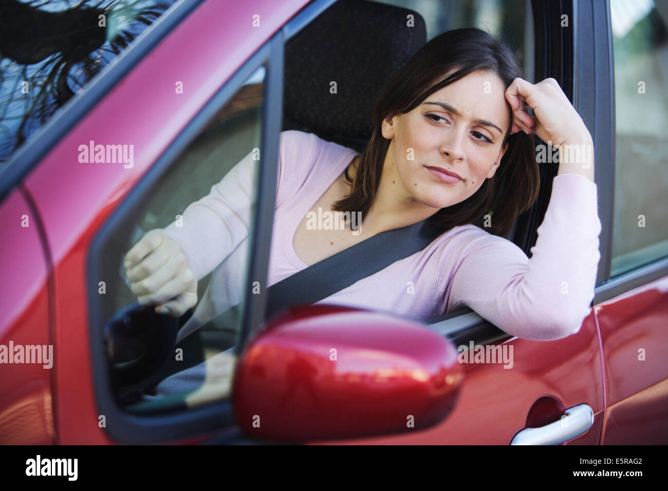 Stressed woman car driving Stock Photo - Alamy
