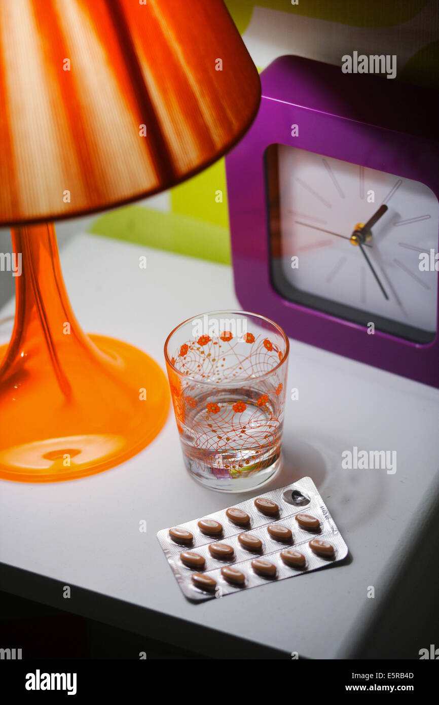 Tablets on a night table Stock Photo - Alamy