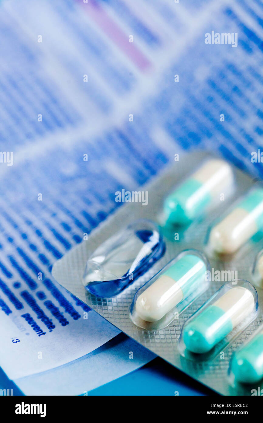 Instructions and capsules Stock Photo - Alamy