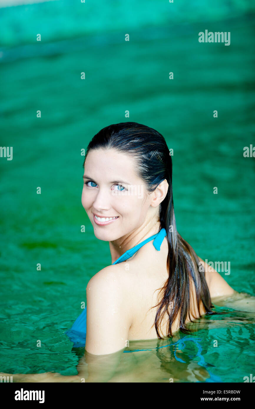 Woman in a swimming pool Stock Photo - Alamy
