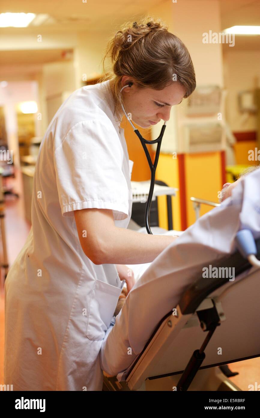 Intern doctor examining a patient, Emergency department, Limoges ...