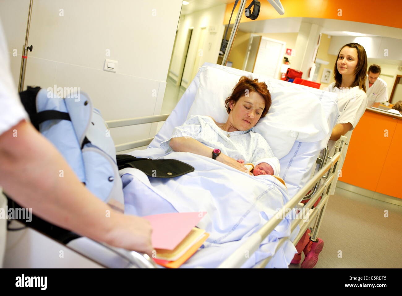 Mother with her newborn baby after delivery, Obstetrics and gynaecology ...