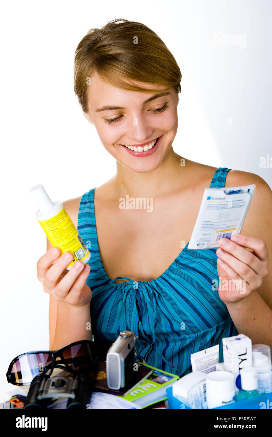 Woman preparing medical kit hi-res stock photography and images - Alamy