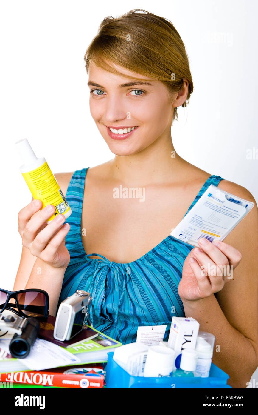 Woman preparing first aid kit Stock Photo - Alamy