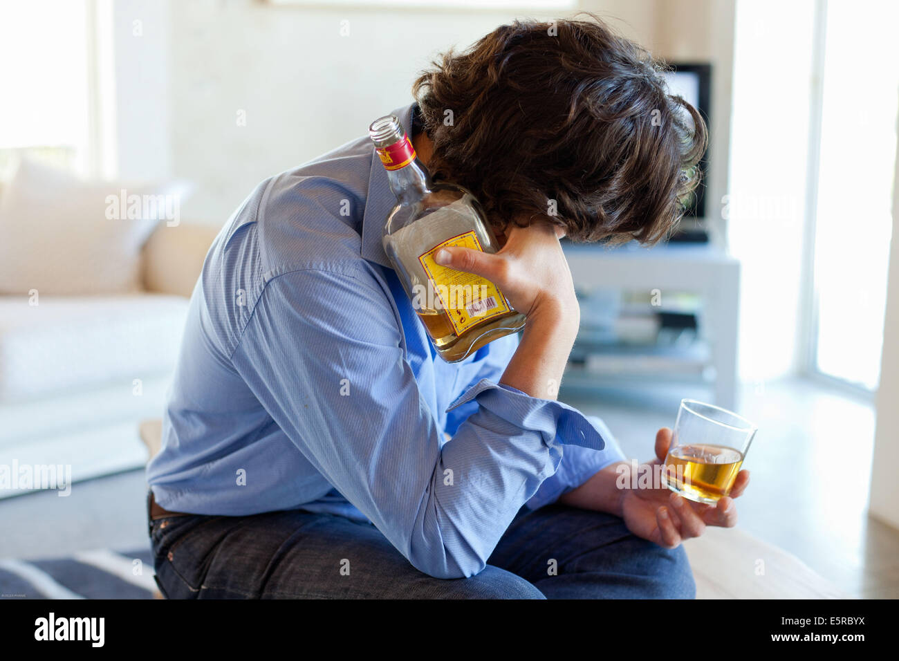 Man drinking Alcohol Stock Photo - Alamy