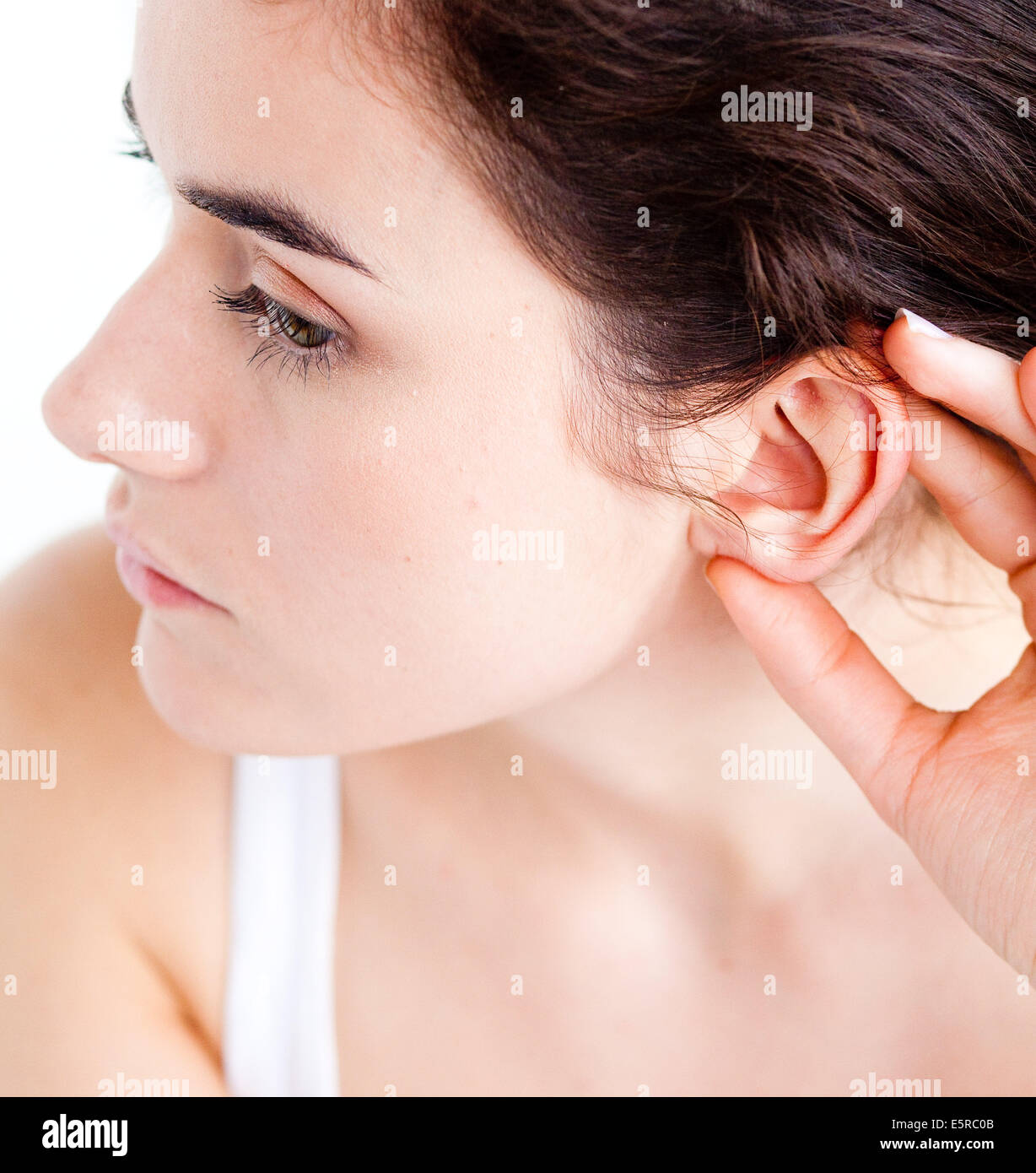 Old woman with hand of ear hi-res stock photography and images - Alamy