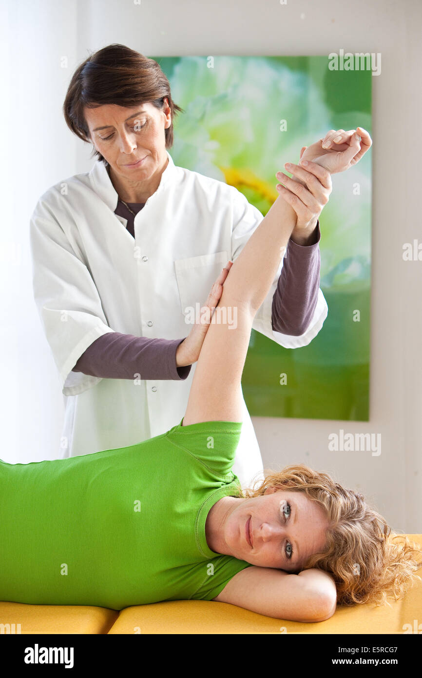 Patient receiving physiotherapy massage Stock Photo - Alamy