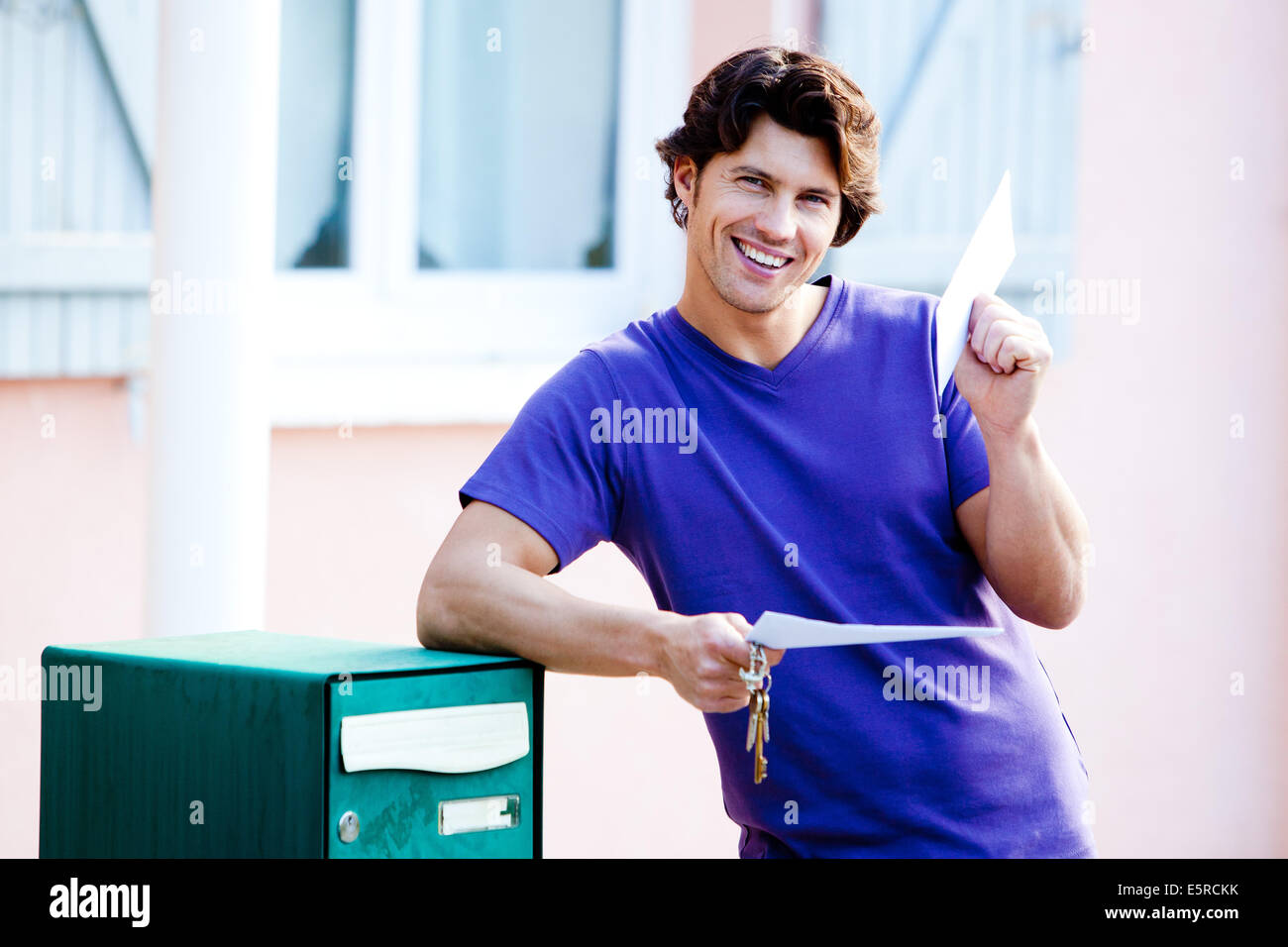 Man receiving letters Stock Photo - Alamy