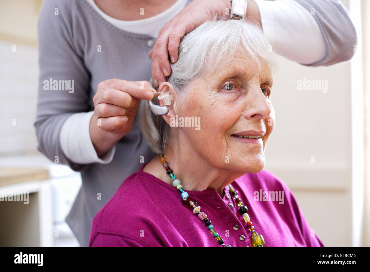 Helping the deaf hi-res stock photography and images - Alamy