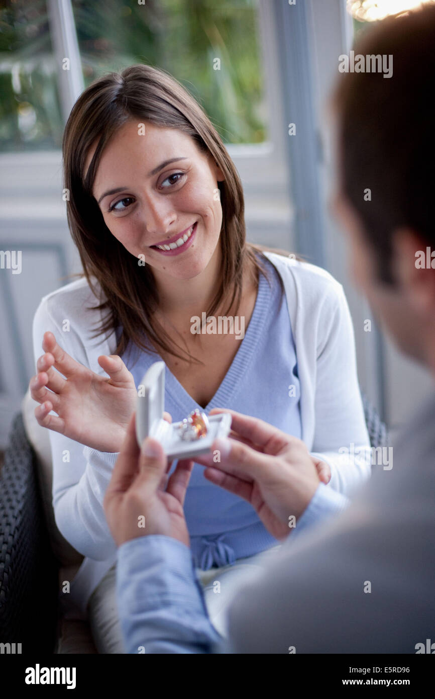 Woman receiving a present Stock Photo - Alamy