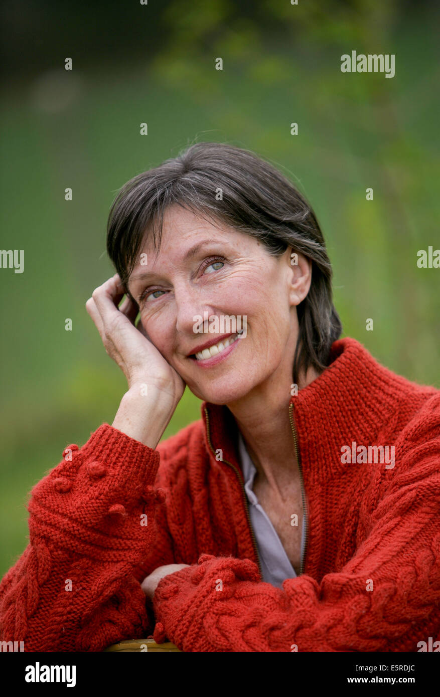 60 year old woman smiling hi-res stock photography and images - Alamy