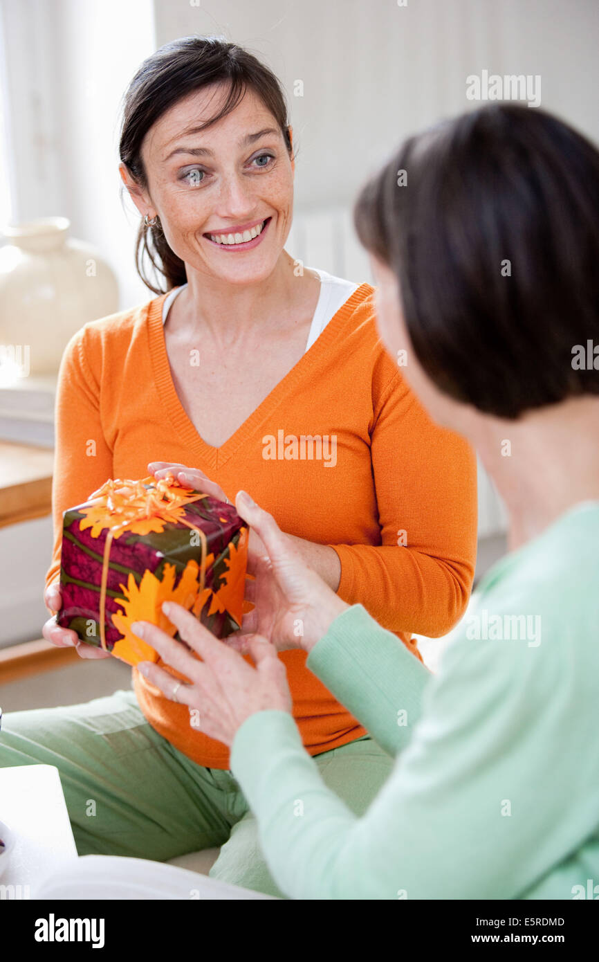 Woman receiving a gift Stock Photo - Alamy