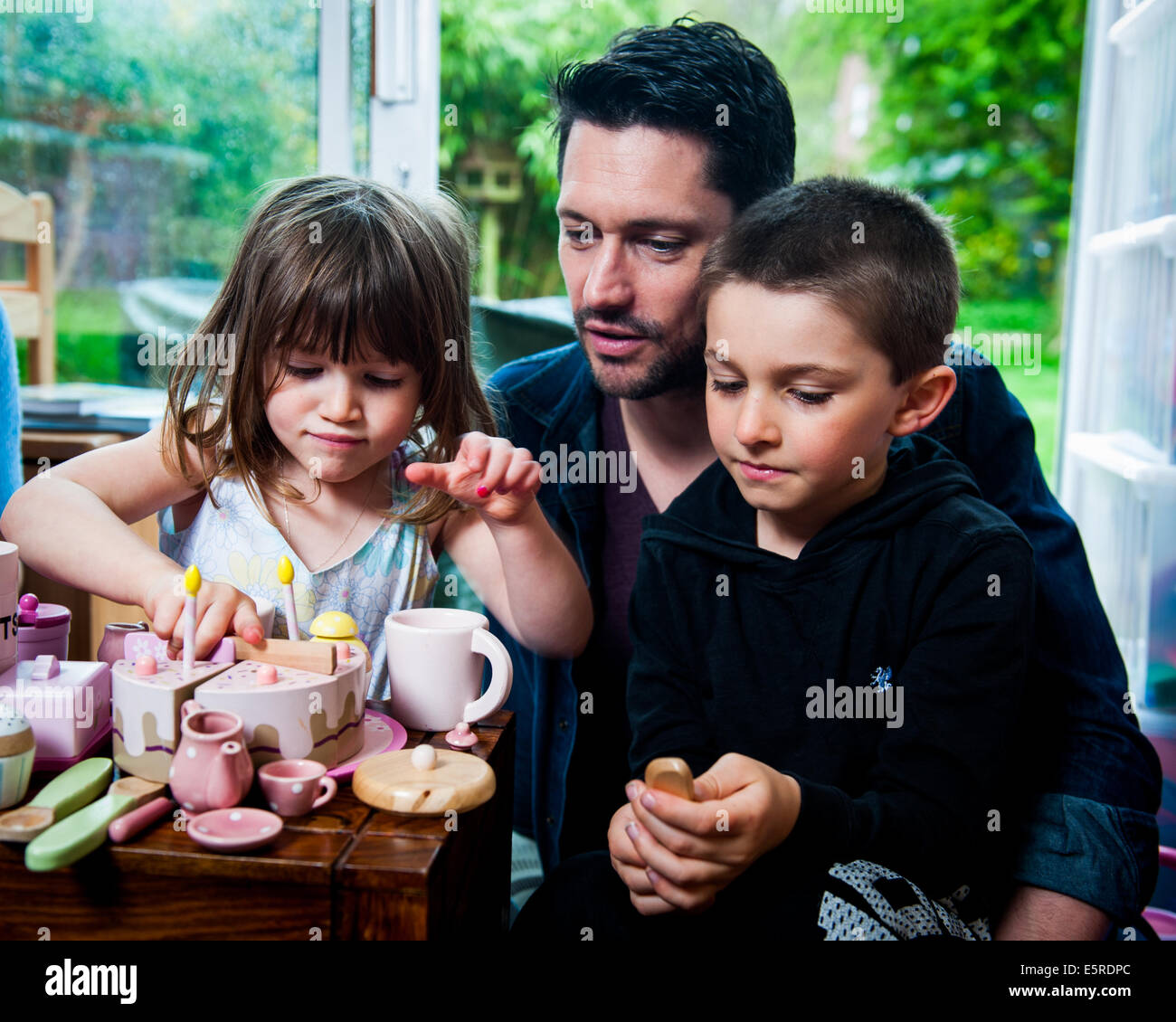 Man 30s with young son and daughter Stock Photo - Alamy