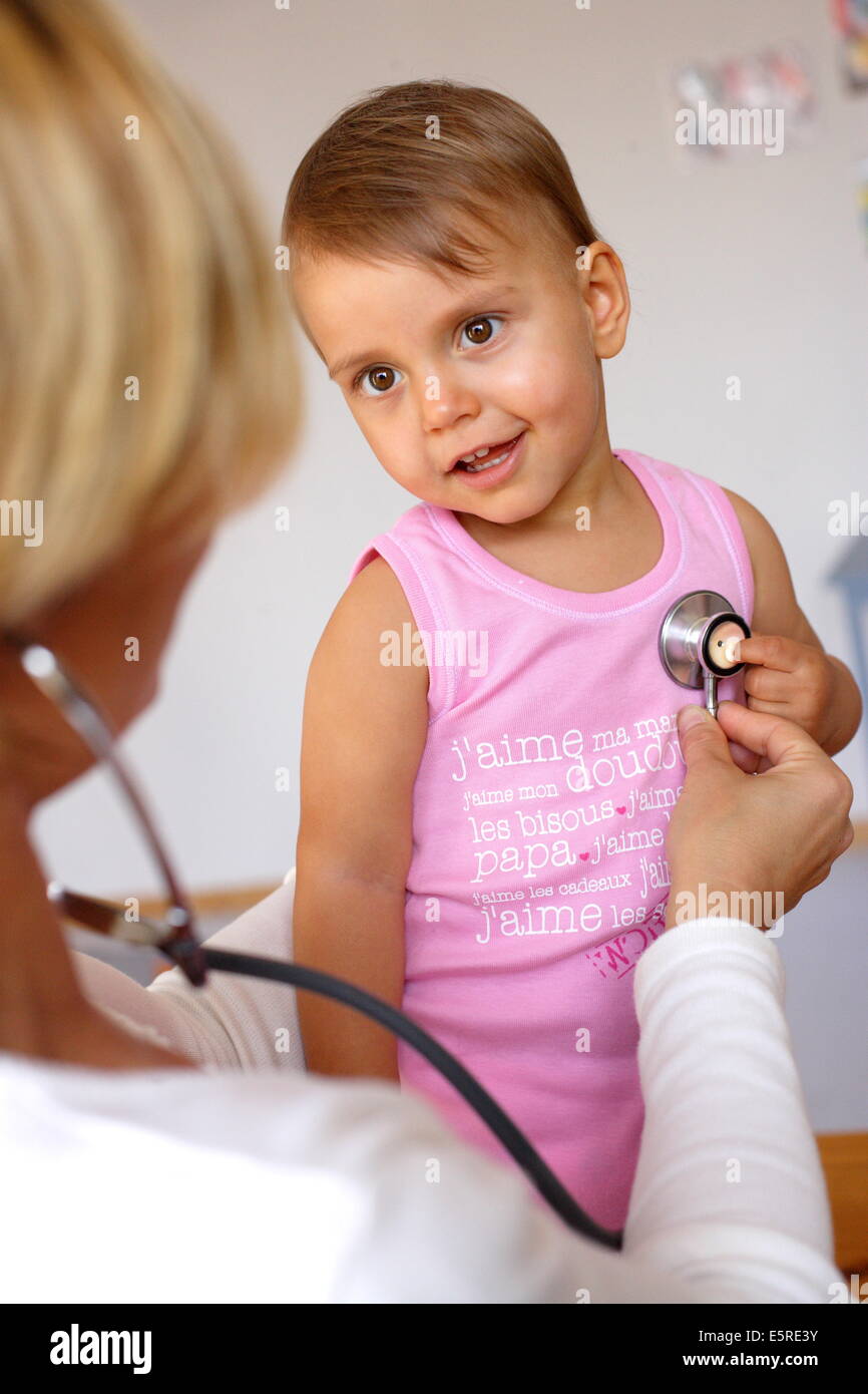 Doctor examining 18 month old baby with a stethoscope Stock Photo - Alamy