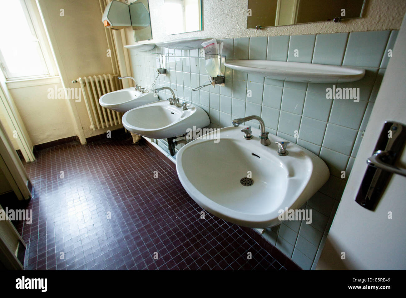 Bathroom in community Stock Photo - Alamy
