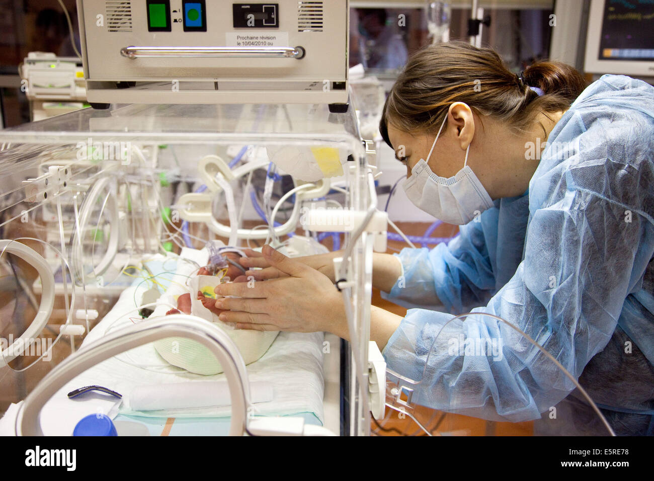 Premature newborn baby placed under respiratory assistance, Neonatalogy ...