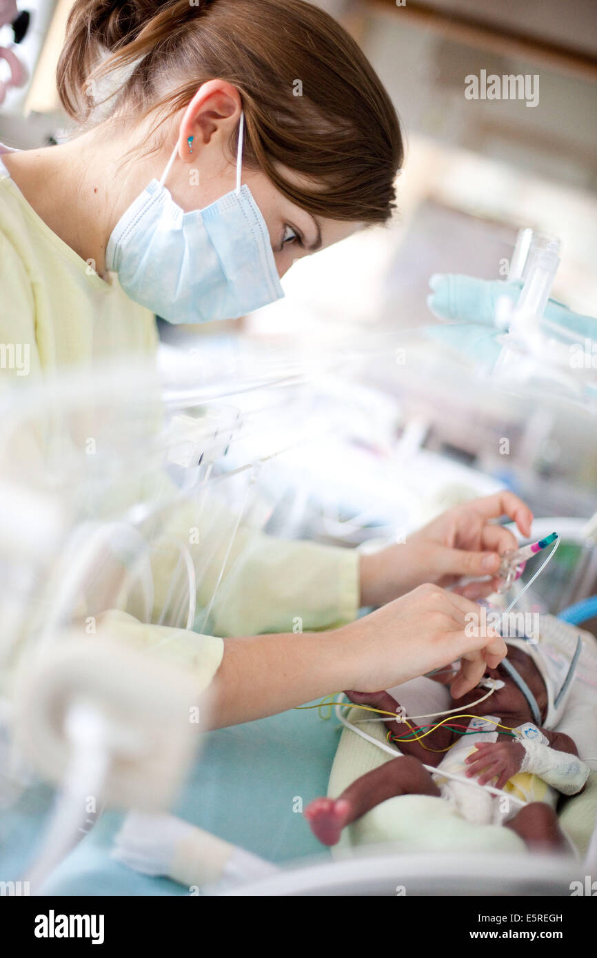 Premature newborn baby placed under respiratory assistance, Neonatalogy ...