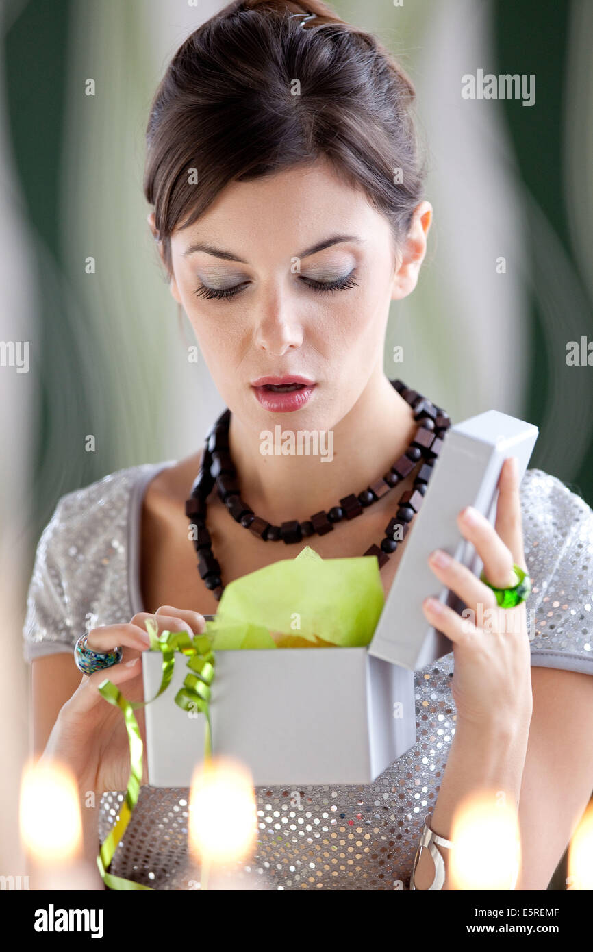Woman receiving a gift Stock Photo - Alamy
