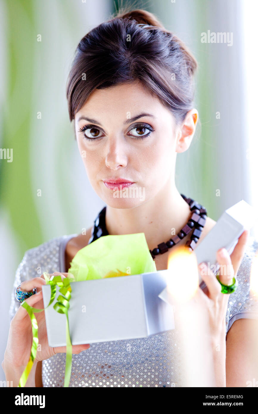 Woman receiving a gift Stock Photo - Alamy