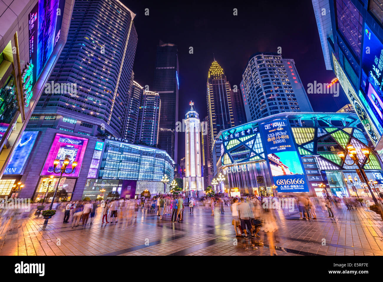 People stroll through the Jiefangbei CBD pedestrian mall in Chongqing ...