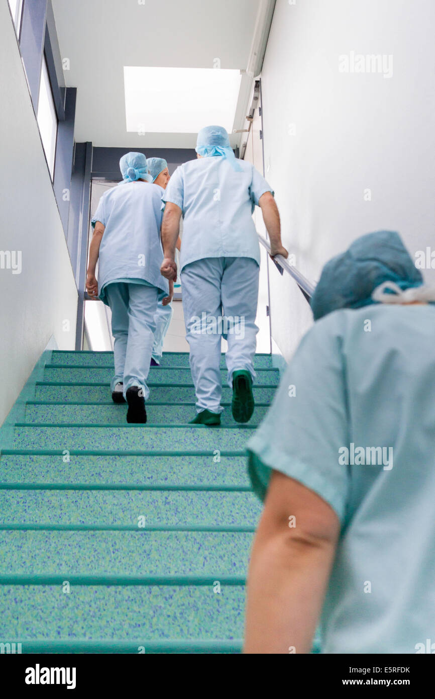 Surgical team leaving the operating room Stock Photo - Alamy