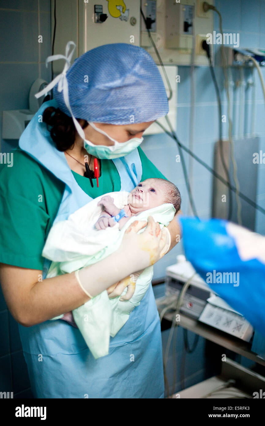 Delivery, Midwife with a newborn baby, Maternity department, Cochin ...