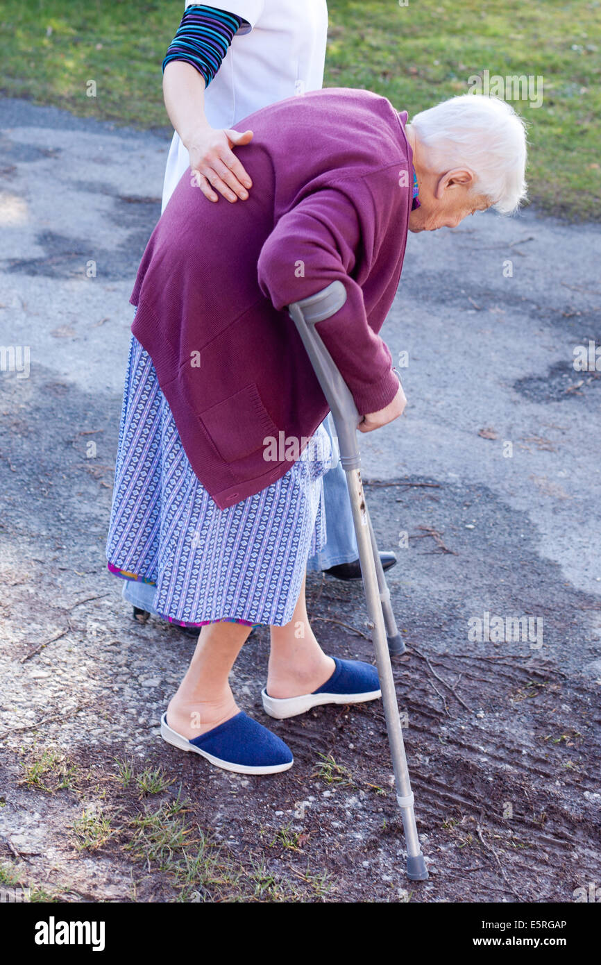 Physiotherapist At The Home Of An Elderly Woman For A Session Of