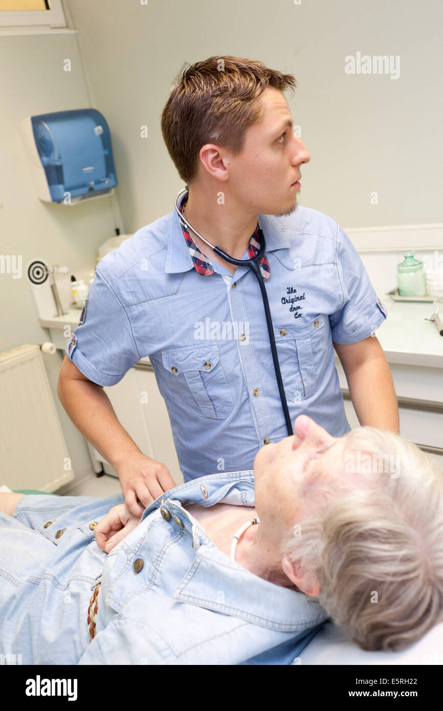 Gp checking pulse hi-res stock photography and images - Alamy