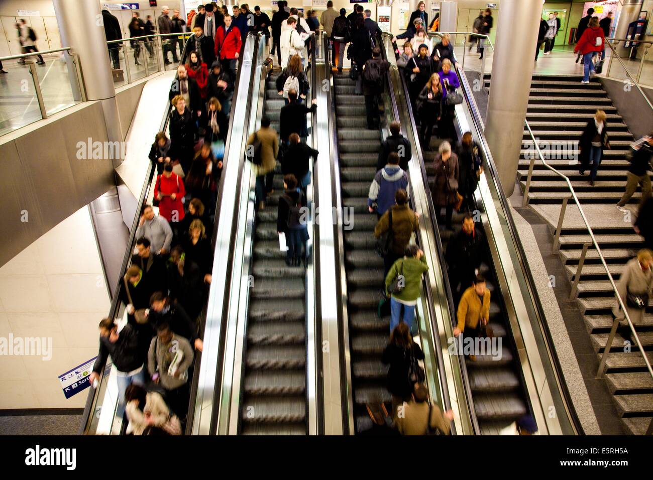 People using escalators Stock Photo - Alamy