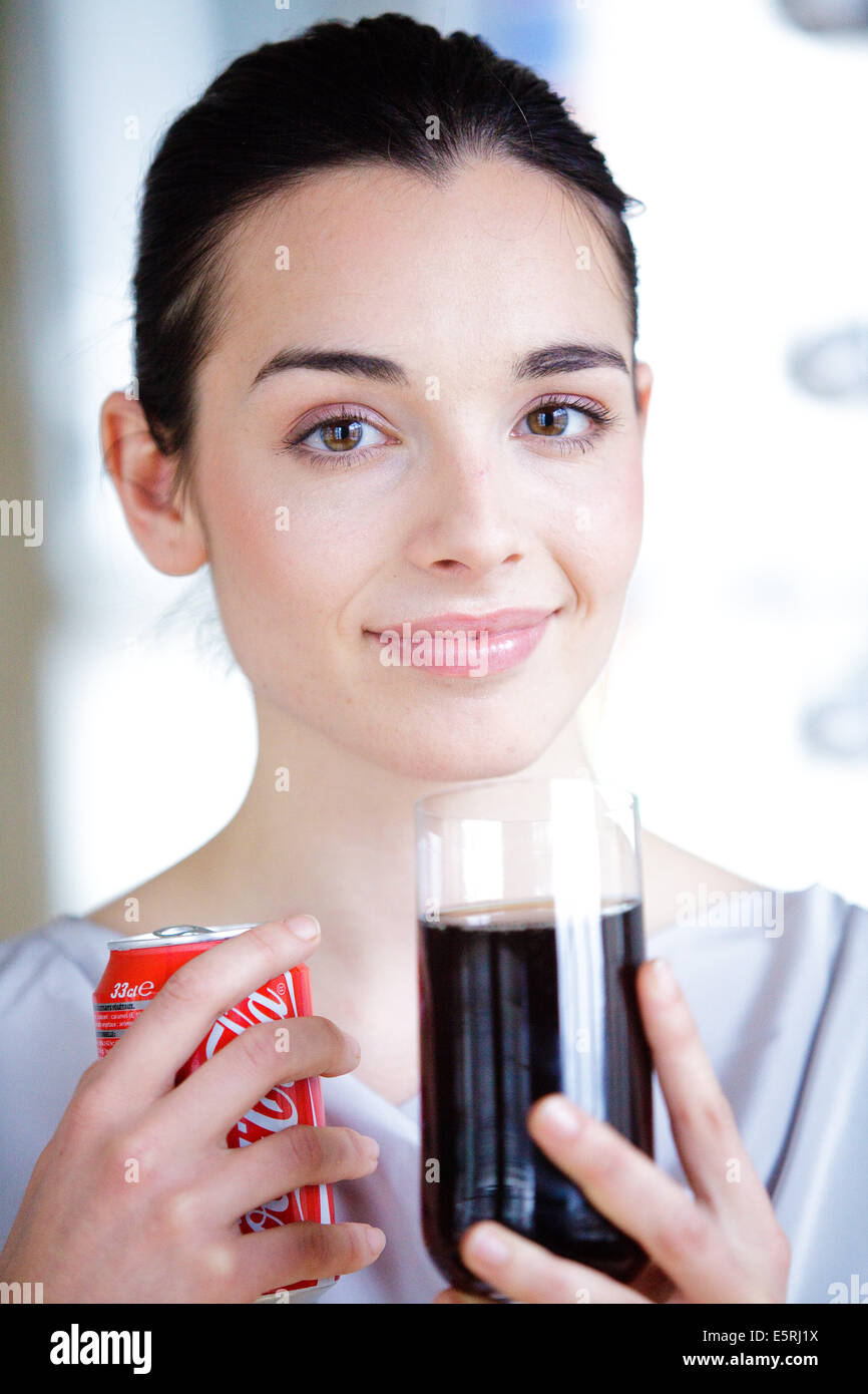 Coca cola woman drinking hi-res stock photography and images - Alamy