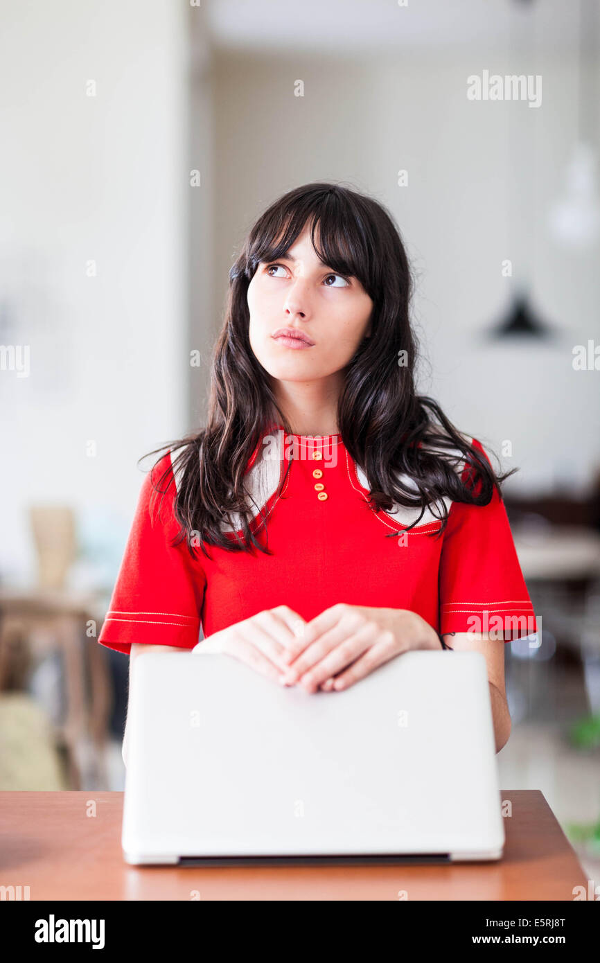 Woman using a laptop Stock Photo - Alamy