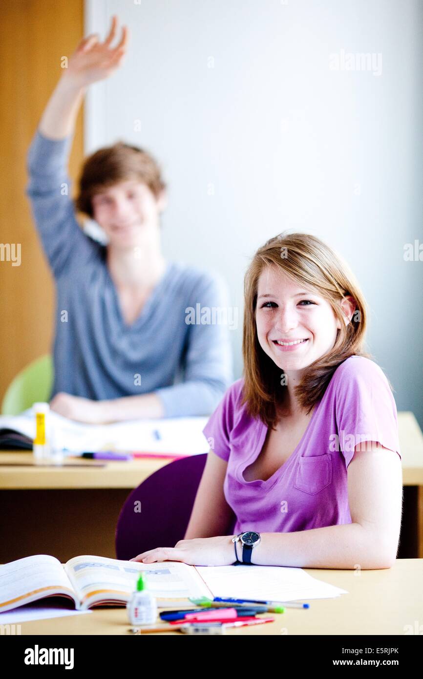 Teenagers in a classroom Stock Photo - Alamy