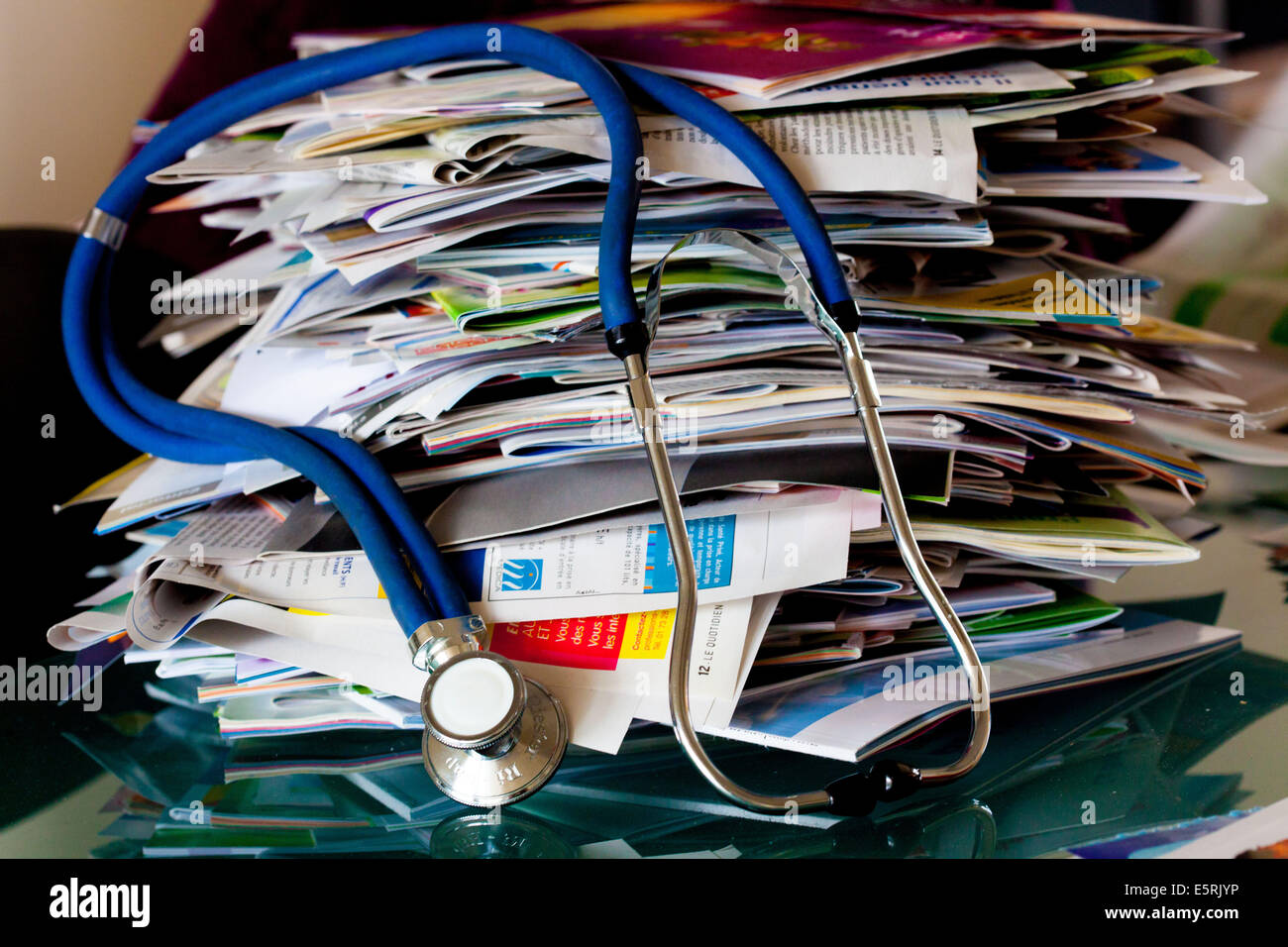 Magazines and stethoscope, Medical press Stock Photo - Alamy