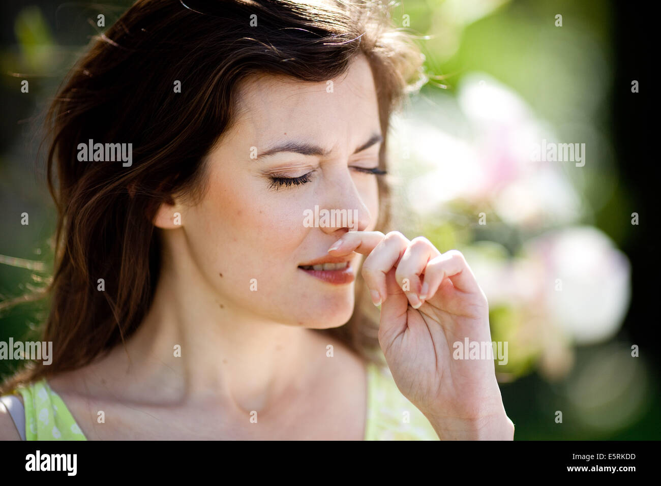 Woman suffering from allergic rhinitis Stock Photo - Alamy
