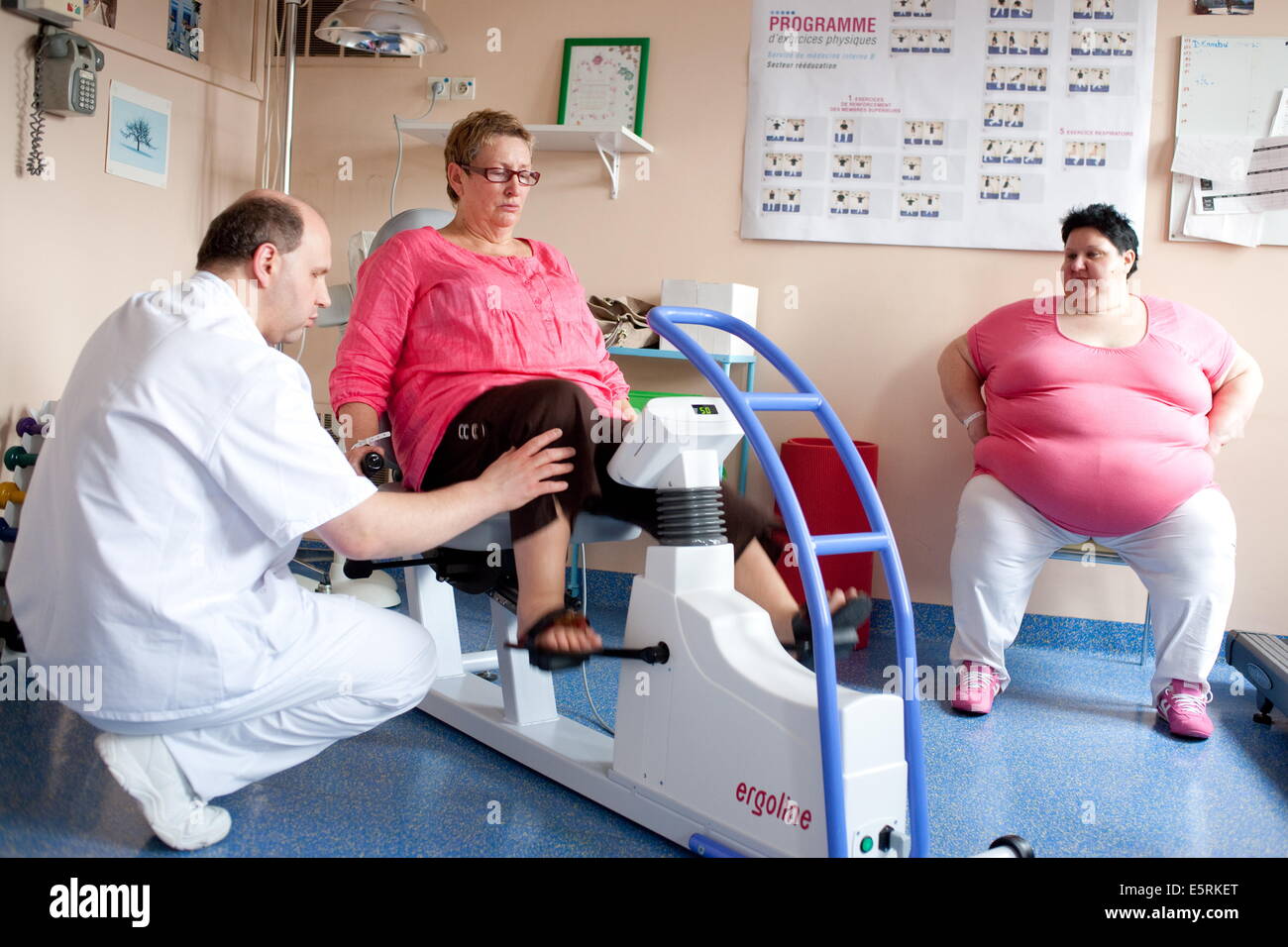Female patients following an exercise program with a physiotherapist ...