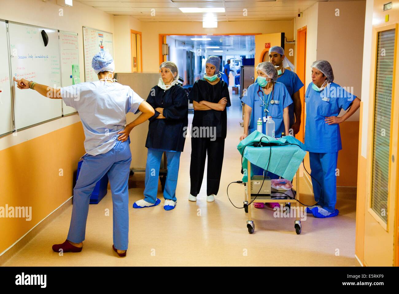 Surgery team before an operation, Lariboisiere hospital Stock Photo - Alamy