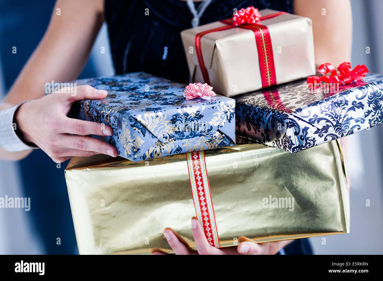 Woman recieving gifts Stock Photo - Alamy