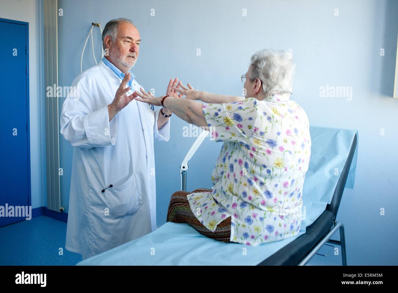 Elderly patient in consultation with a gerontologist; Residential home ...