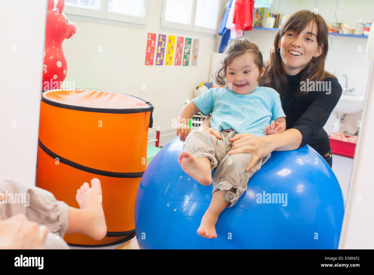 Half girl with down syndrome hi-res stock photography and images - Alamy