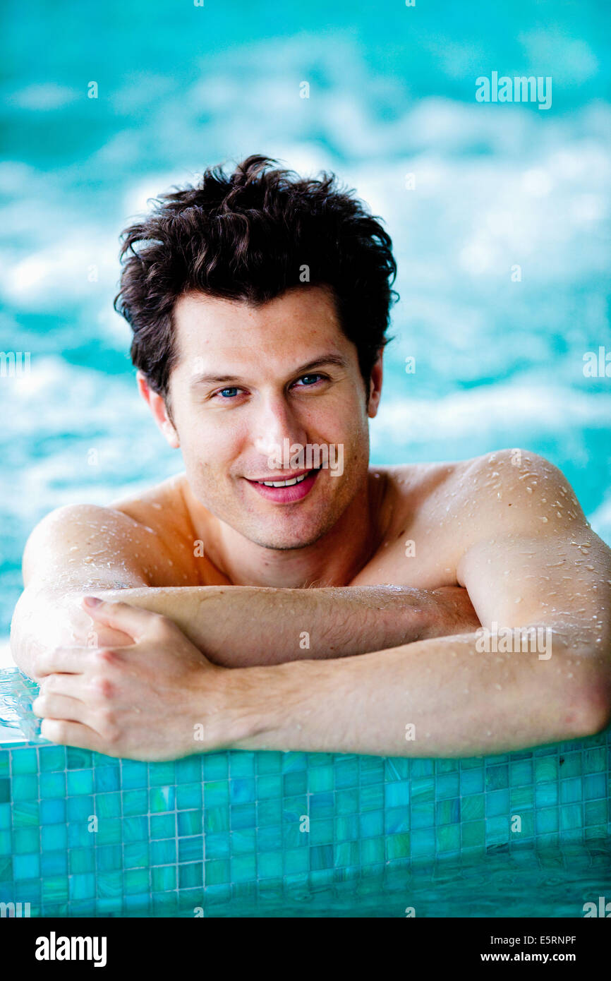Man in spa pool Stock Photo - Alamy