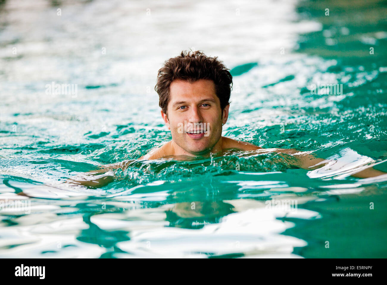Man in a spa pool Stock Photo - Alamy