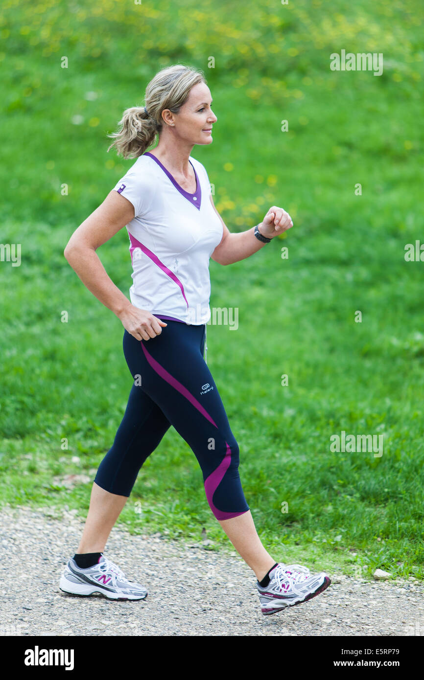Woman practicing active walk Stock Photo - Alamy