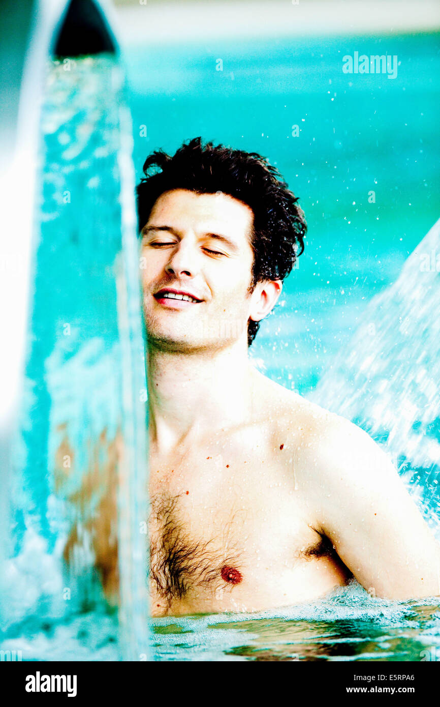 Man in spa pool Stock Photo - Alamy