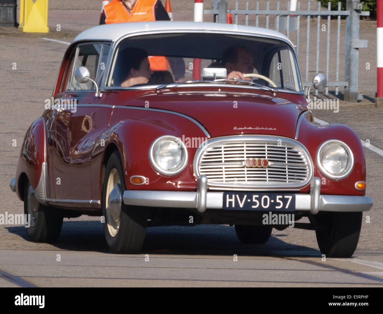 This image features a 1964 Auto Union 1000S de Luxe, a luxury compact ...