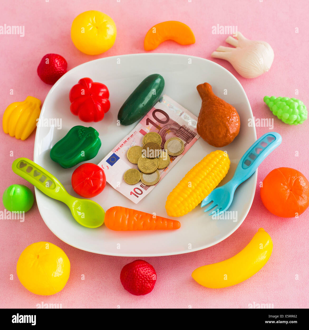 Food for child and money Stock Photo - Alamy