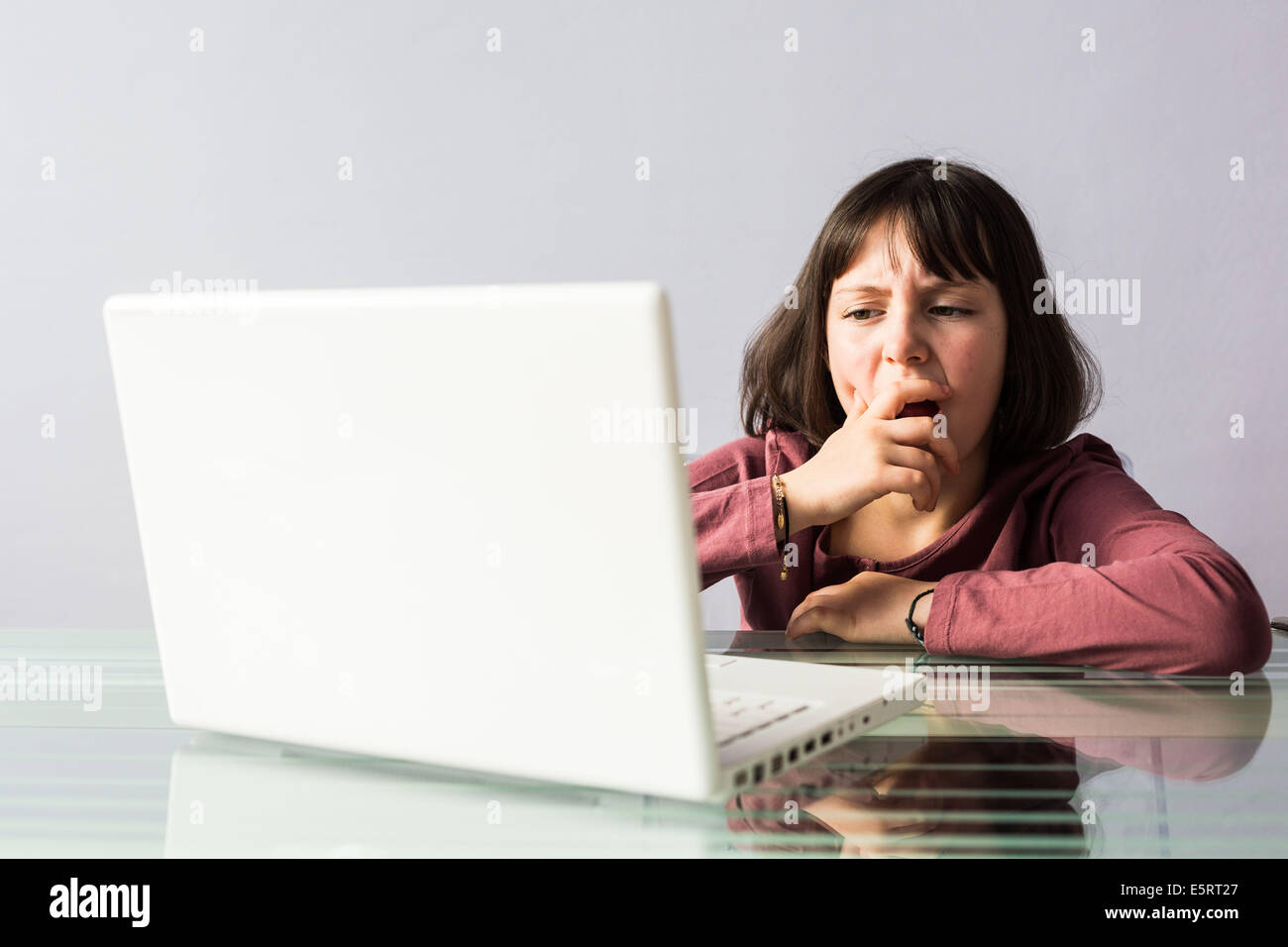 9-year-old girl using laptop computer Stock Photo - Alamy