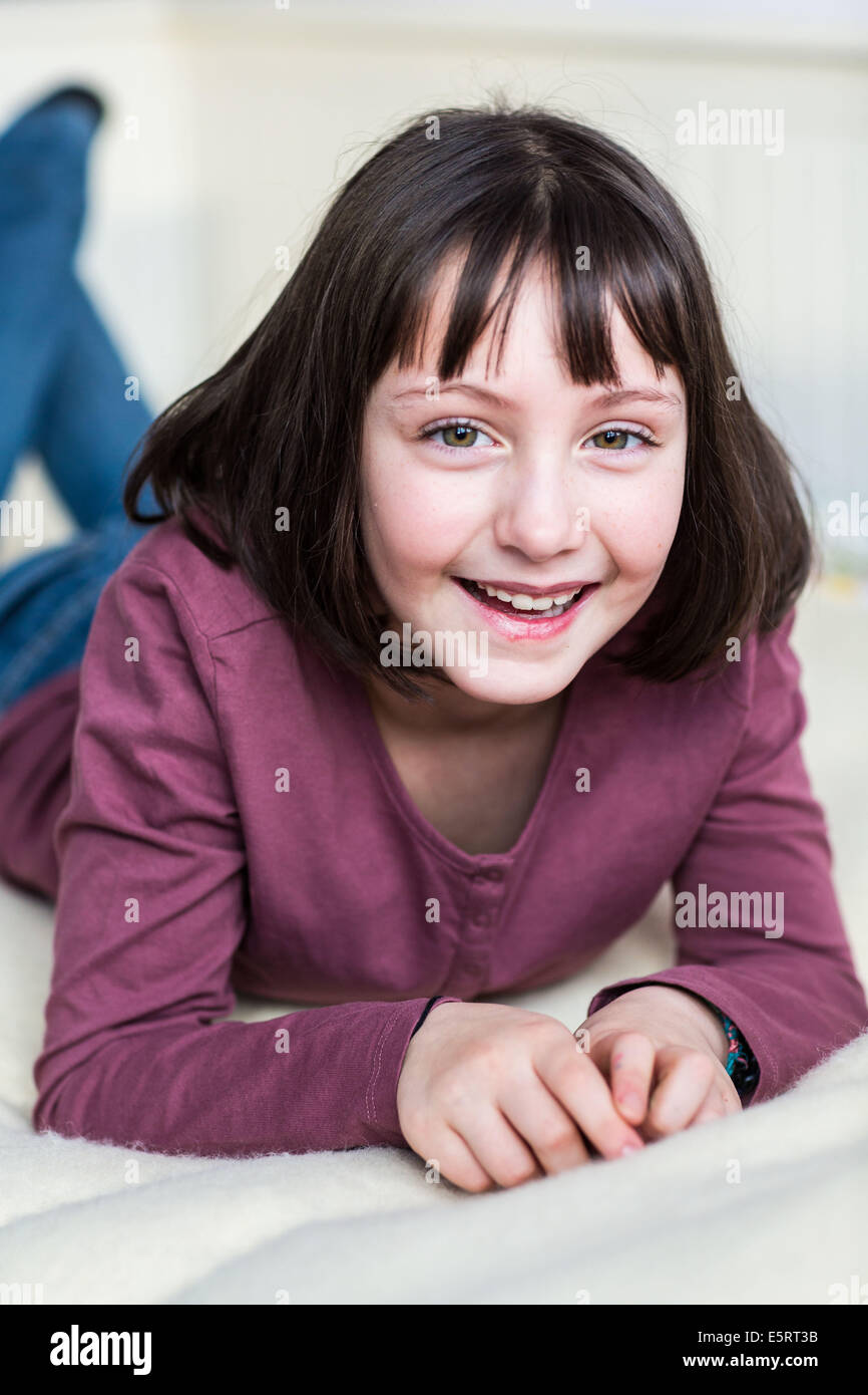 Laughing 9-year-old girl Stock Photo - Alamy